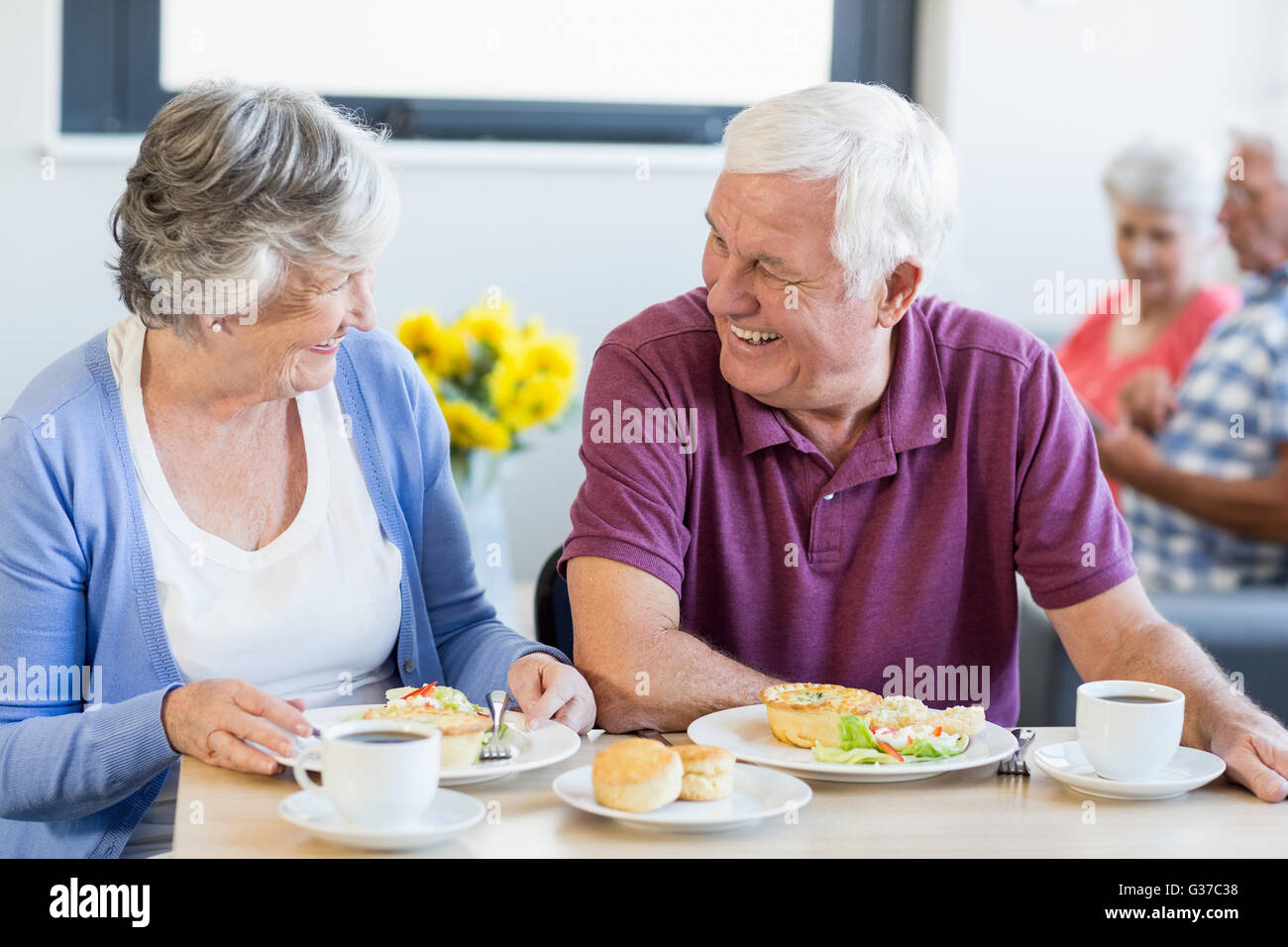 Senior couple having lunch together Stock Photo - Alamy