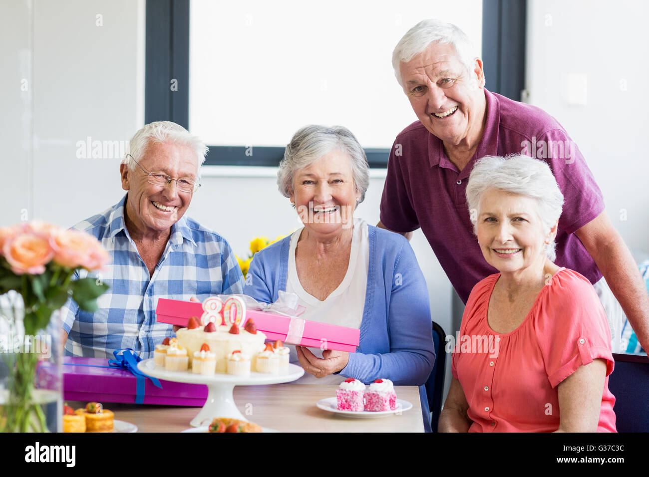 Seniors celebrating a birthday Stock Photo - Alamy
