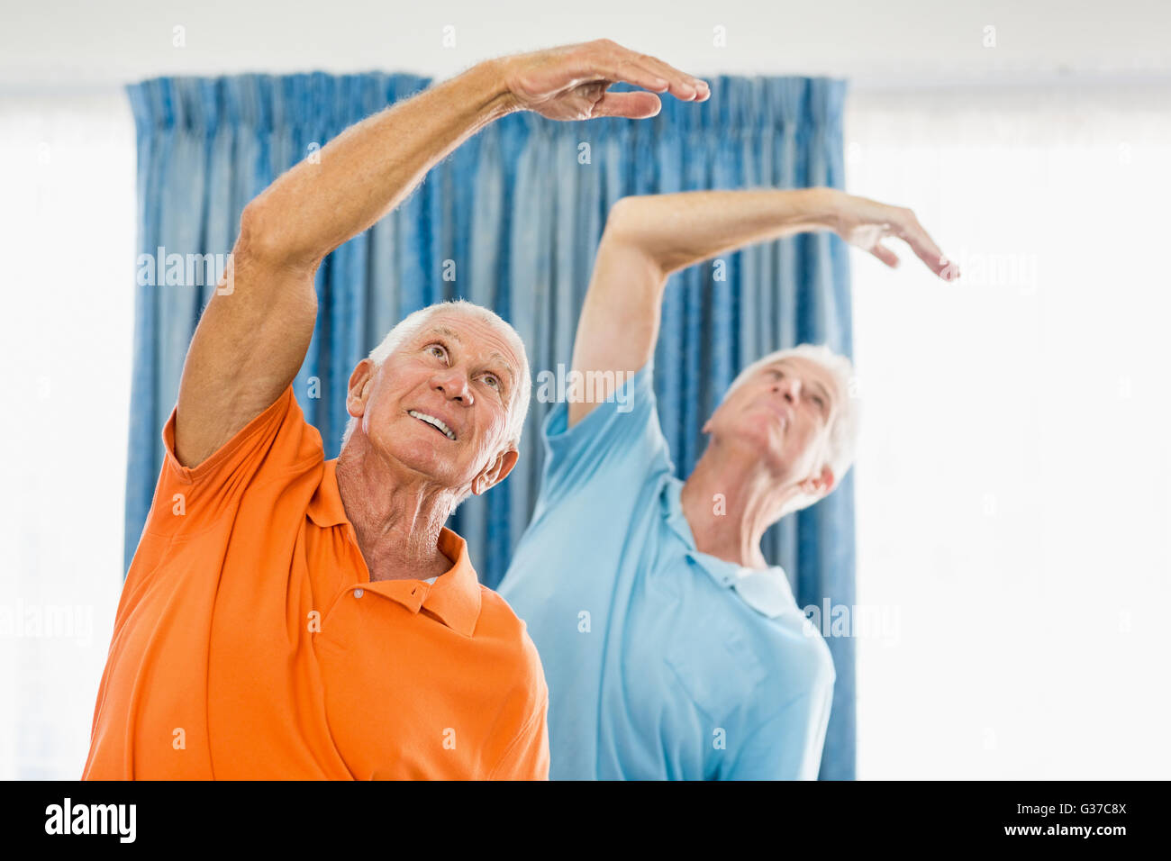 Senior men doing exercises Stock Photo - Alamy