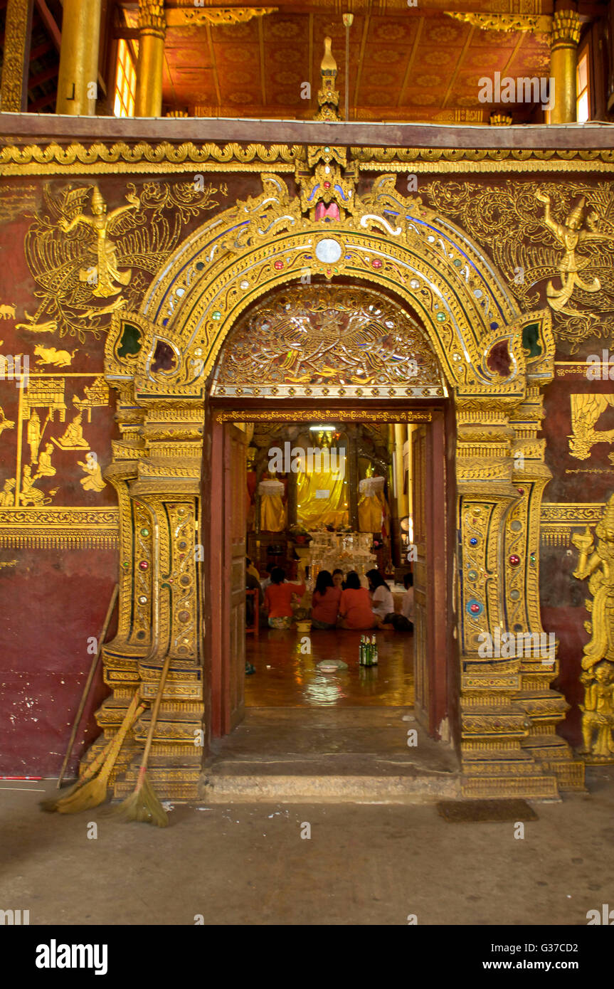 The gilded WAT JONG KHAM - KENGTUNG also known as MYANMAR a family ...