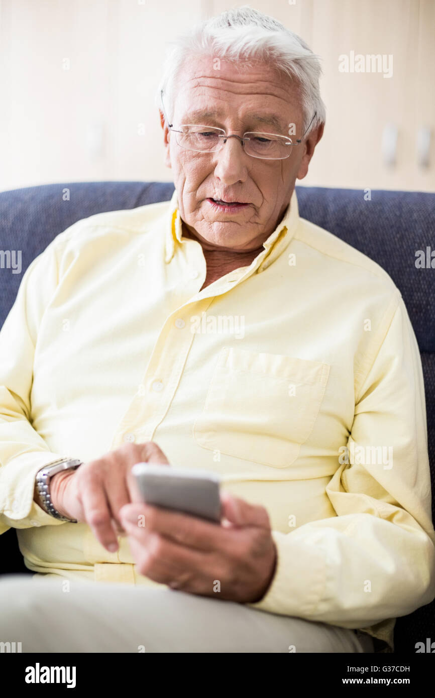 Senior using a smartphone Stock Photo - Alamy