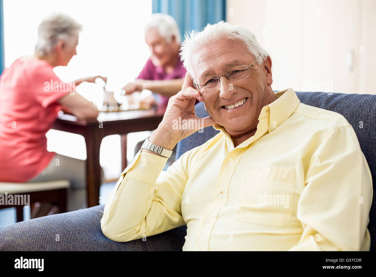 Senior sitting hi-res stock photography and images - Alamy