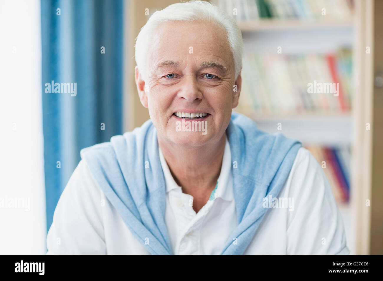 Senior man smiling at camera hi-res stock photography and images - Alamy