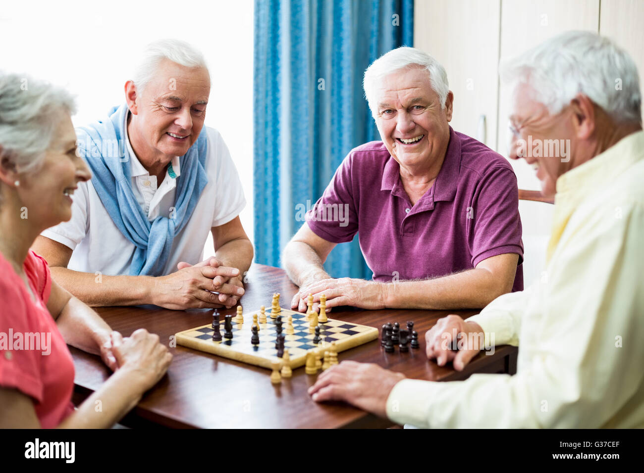 Seniors playing chess Stock Photo - Alamy