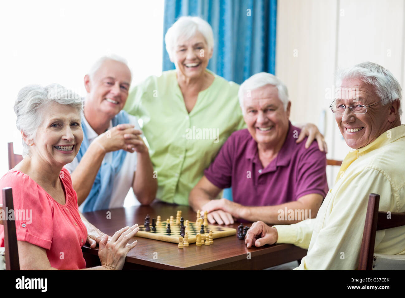 Seniors playing chess Stock Photo - Alamy