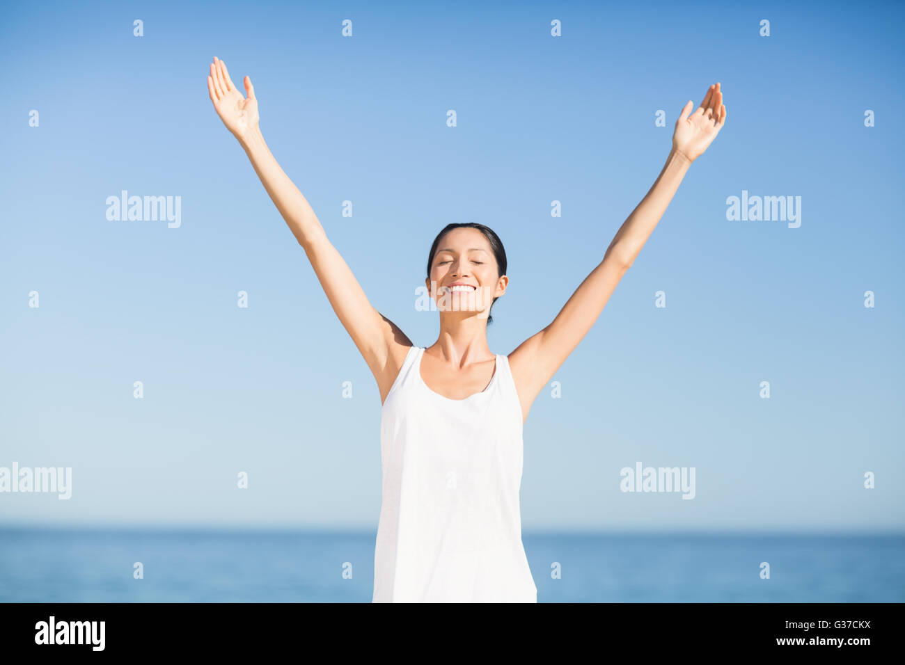 Arms outstretched eyes closed relaxation hi-res stock photography and ...