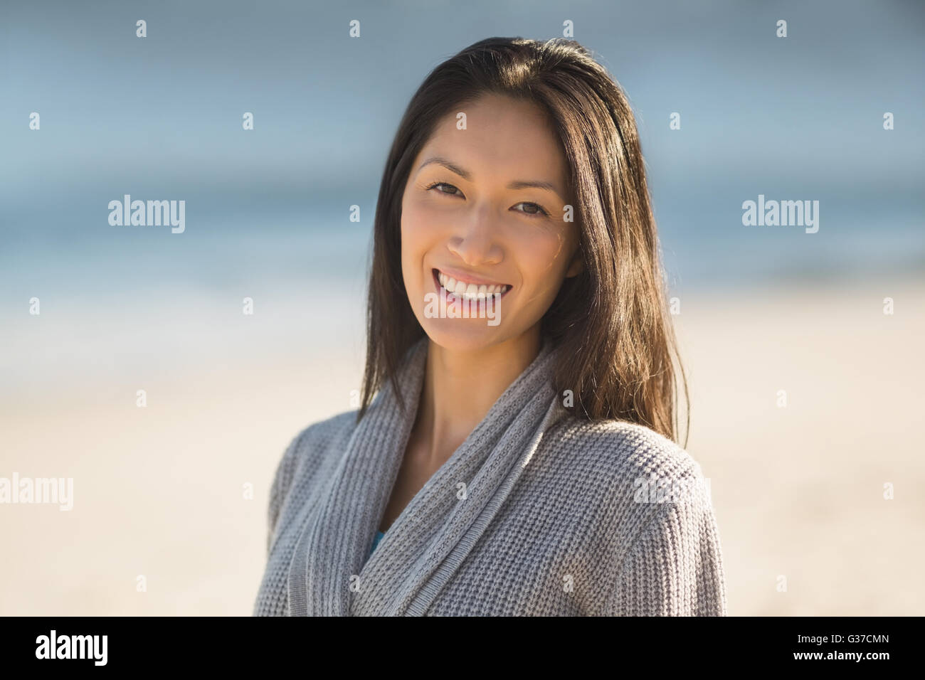 Woman standing beach beach hi-res stock photography and images - Alamy