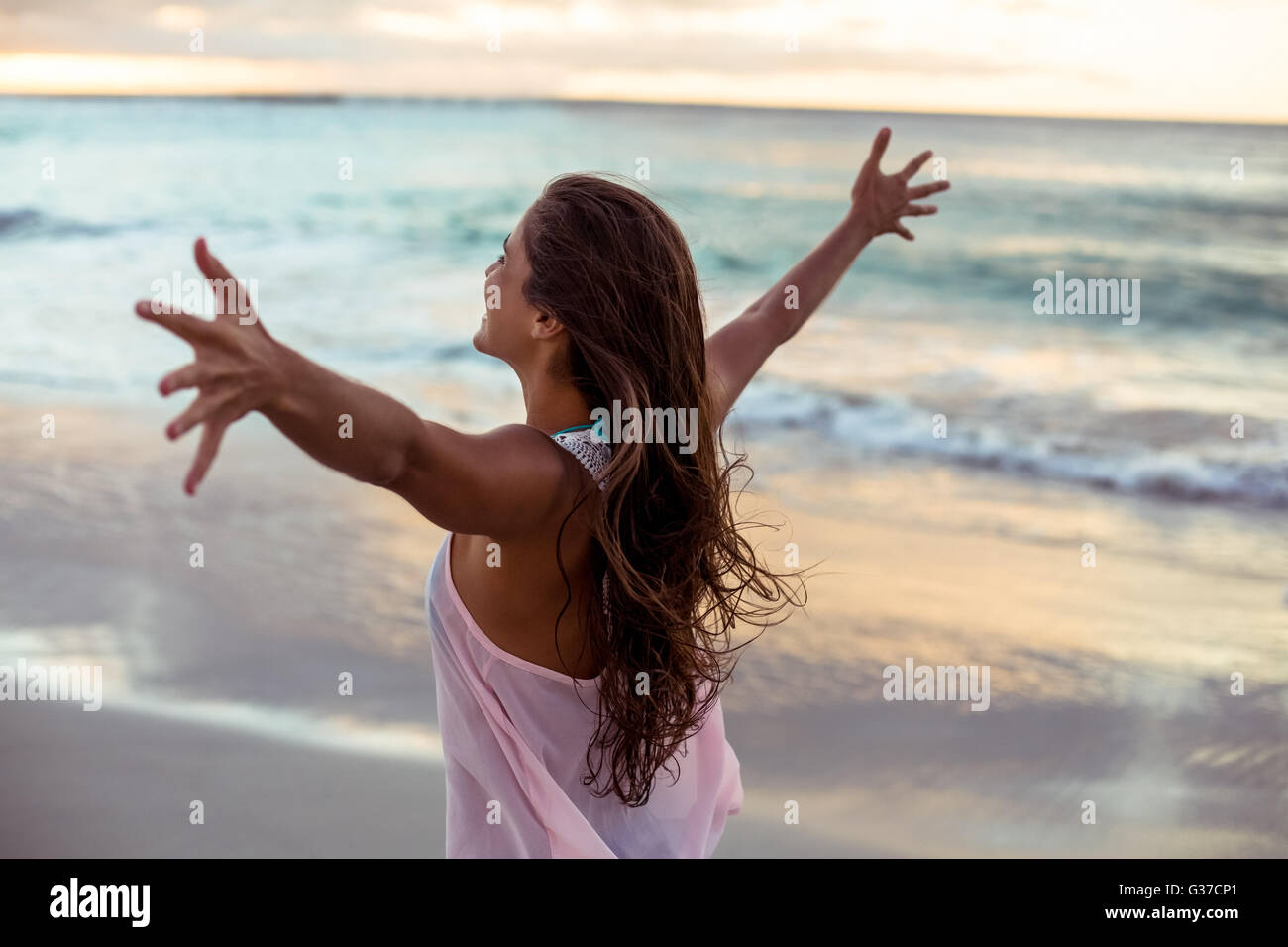 Female standing stretching arms out hi-res stock photography and images ...