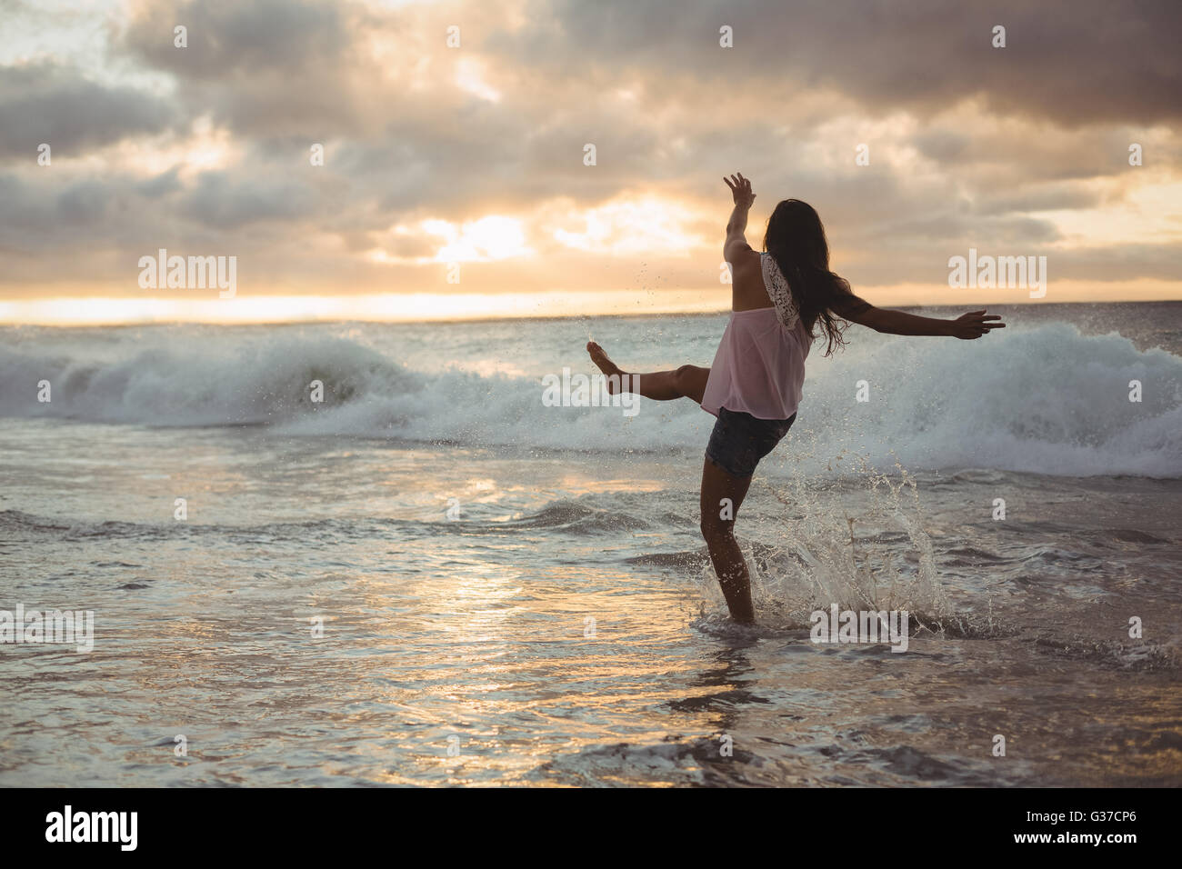 Woman fun beach hi-res stock photography and images - Alamy