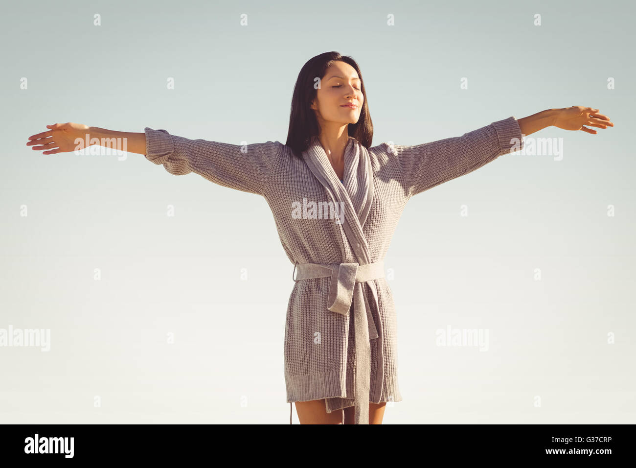 Woman stretching out her arms Stock Photo - Alamy