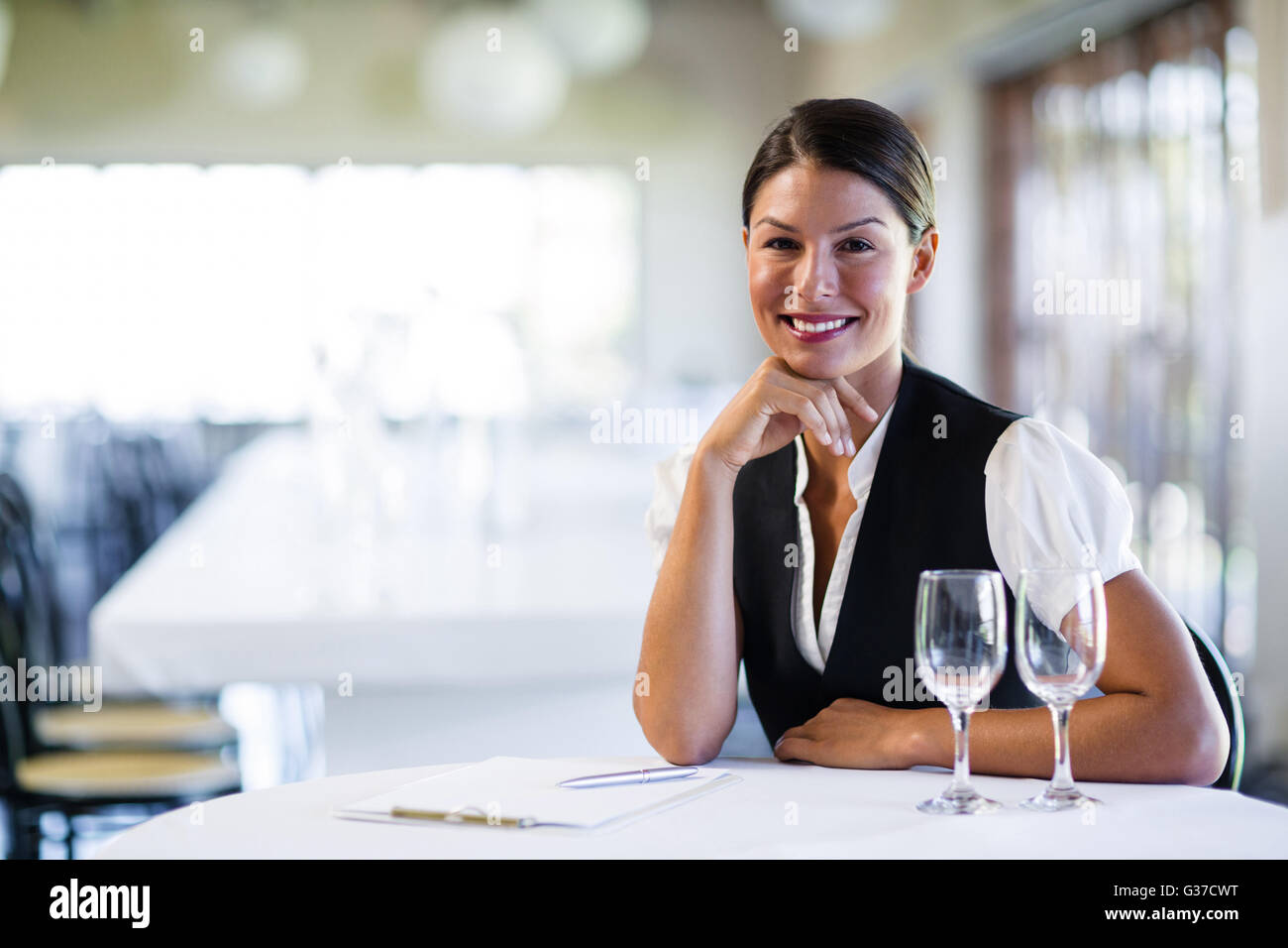 Uniform smiling sitting hi-res stock photography and images - Alamy