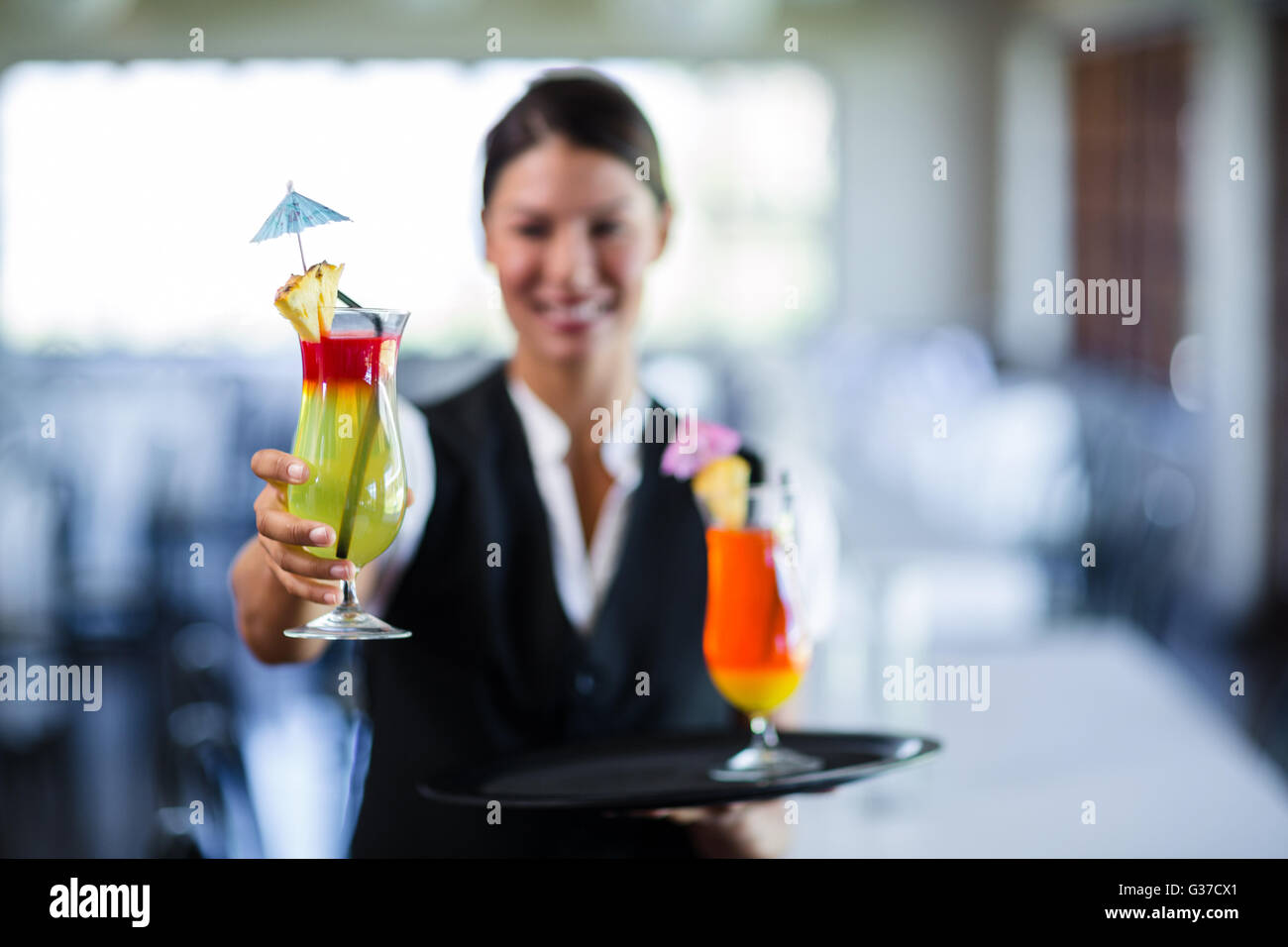 Cocktail waitress hi-res stock photography and images - Alamy