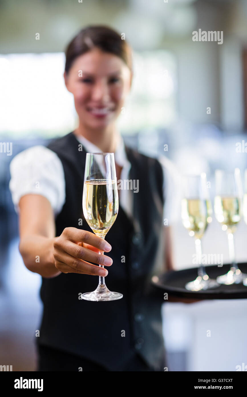 Offering a glass hi-res stock photography and images - Alamy