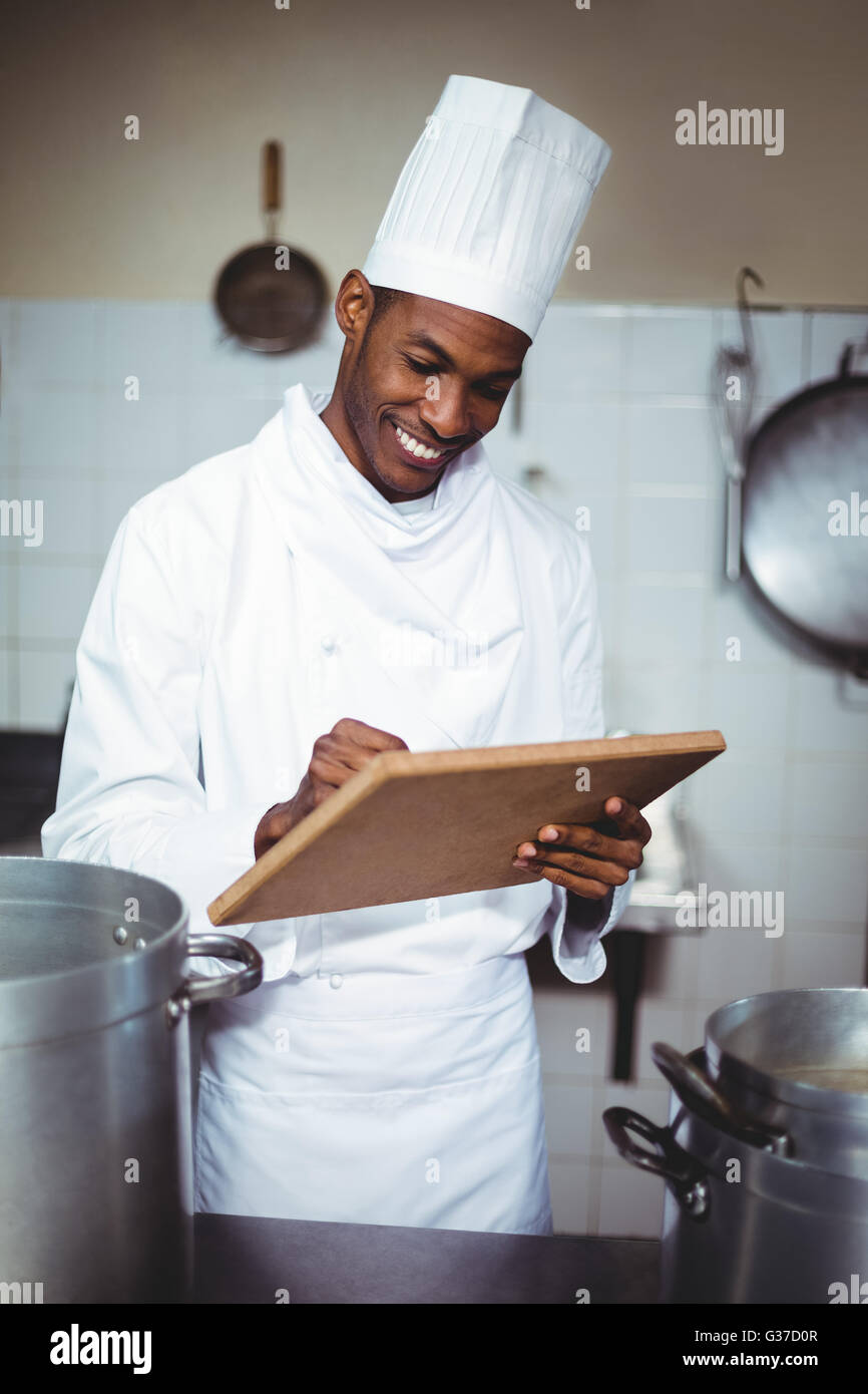 Black male making notes hi-res stock photography and images - Alamy
