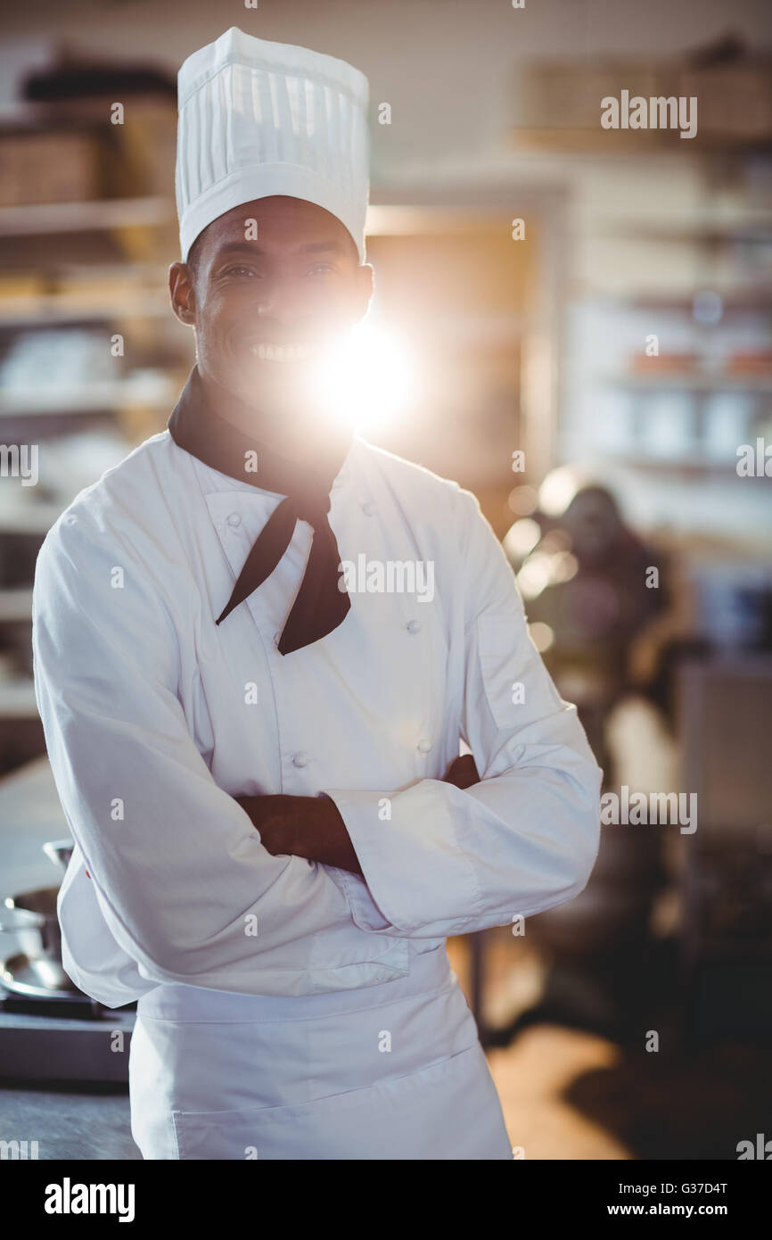 Portrait of happy chef standing with arms crossed Stock Photo - Alamy