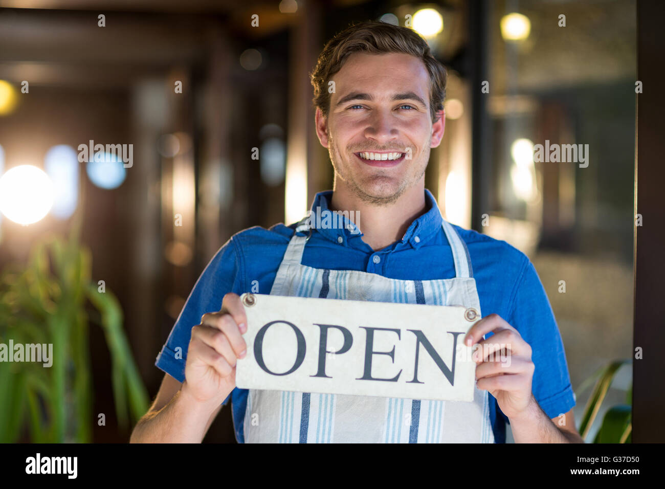 Portrait happy chef holding hi-res stock photography and images - Alamy