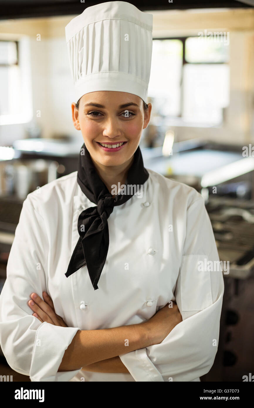 Portrait of smiling chef head standing with arms crossed Stock Photo ...