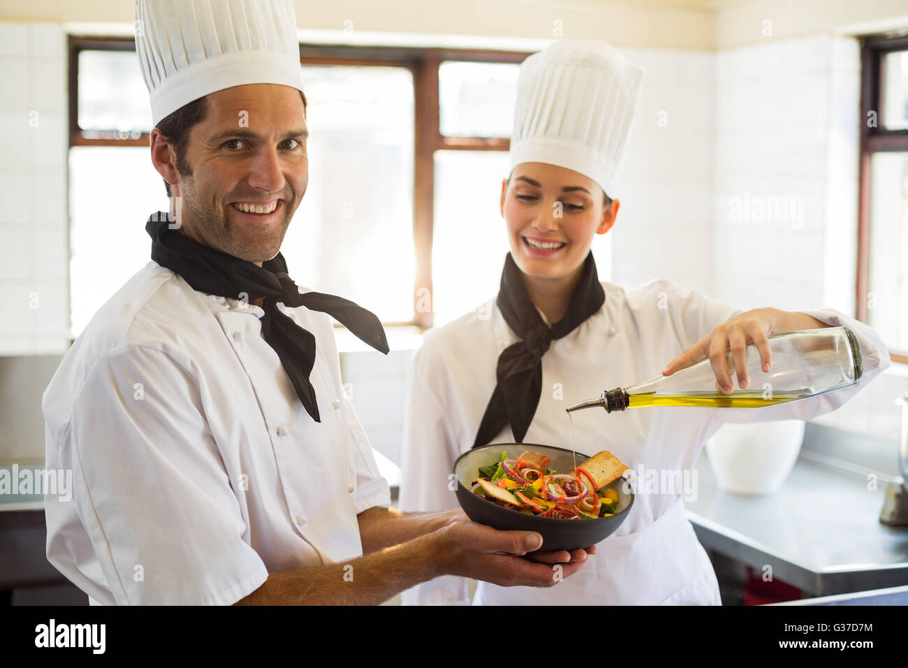 Smiling female chef salad hi-res stock photography and images - Alamy