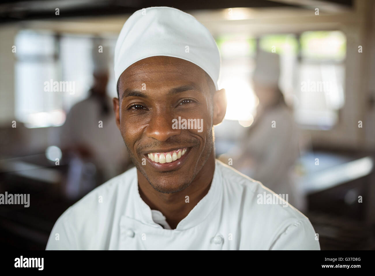 Portrait of smiling chef Stock Photo - Alamy