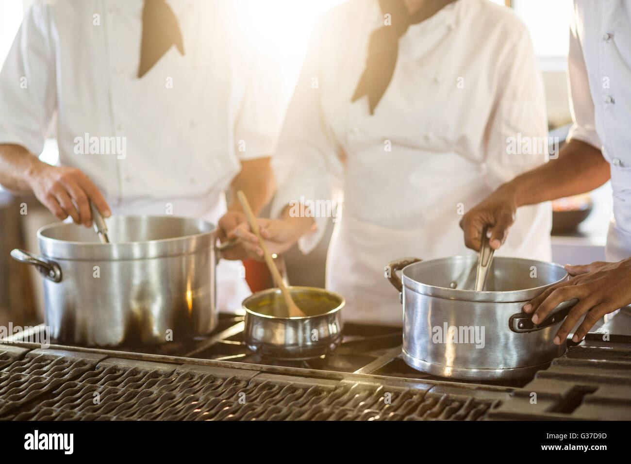 Stirring the pot hi-res stock photography and images - Alamy