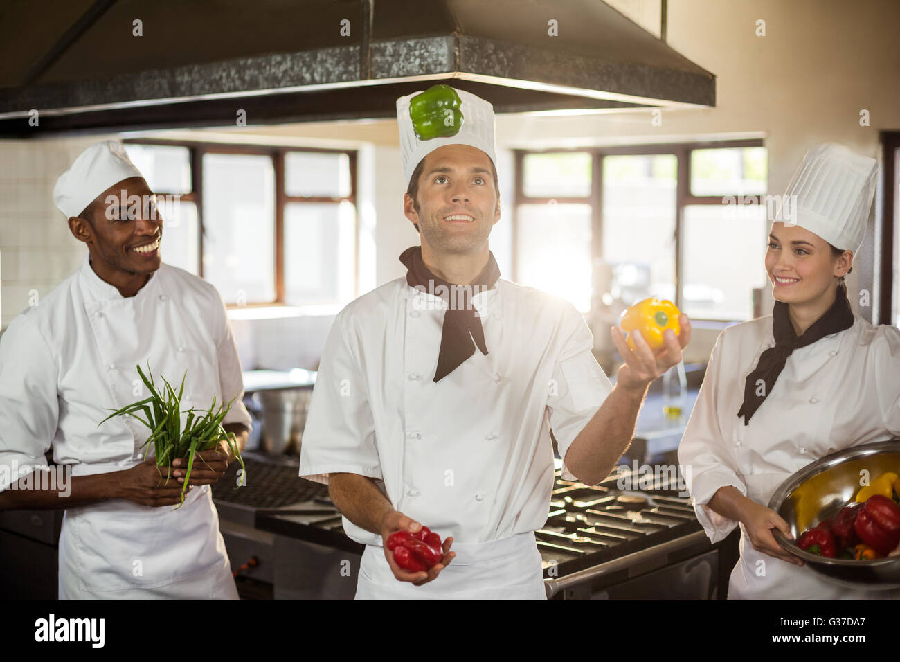 Chef playing with vegetables Stock Photo - Alamy