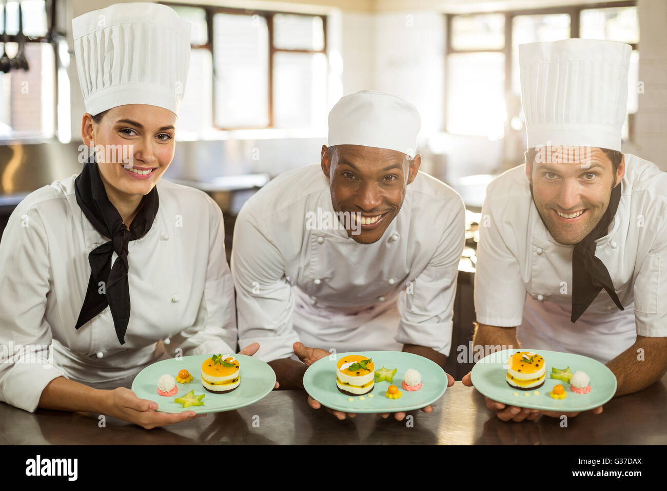 Man holding plates hi-res stock photography and images - Alamy