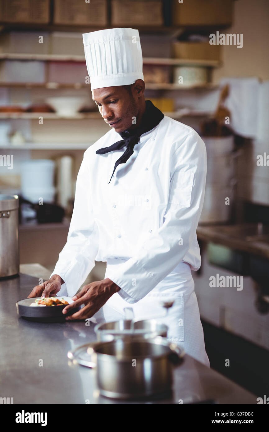 Head chef presenting a salad Stock Photo - Alamy