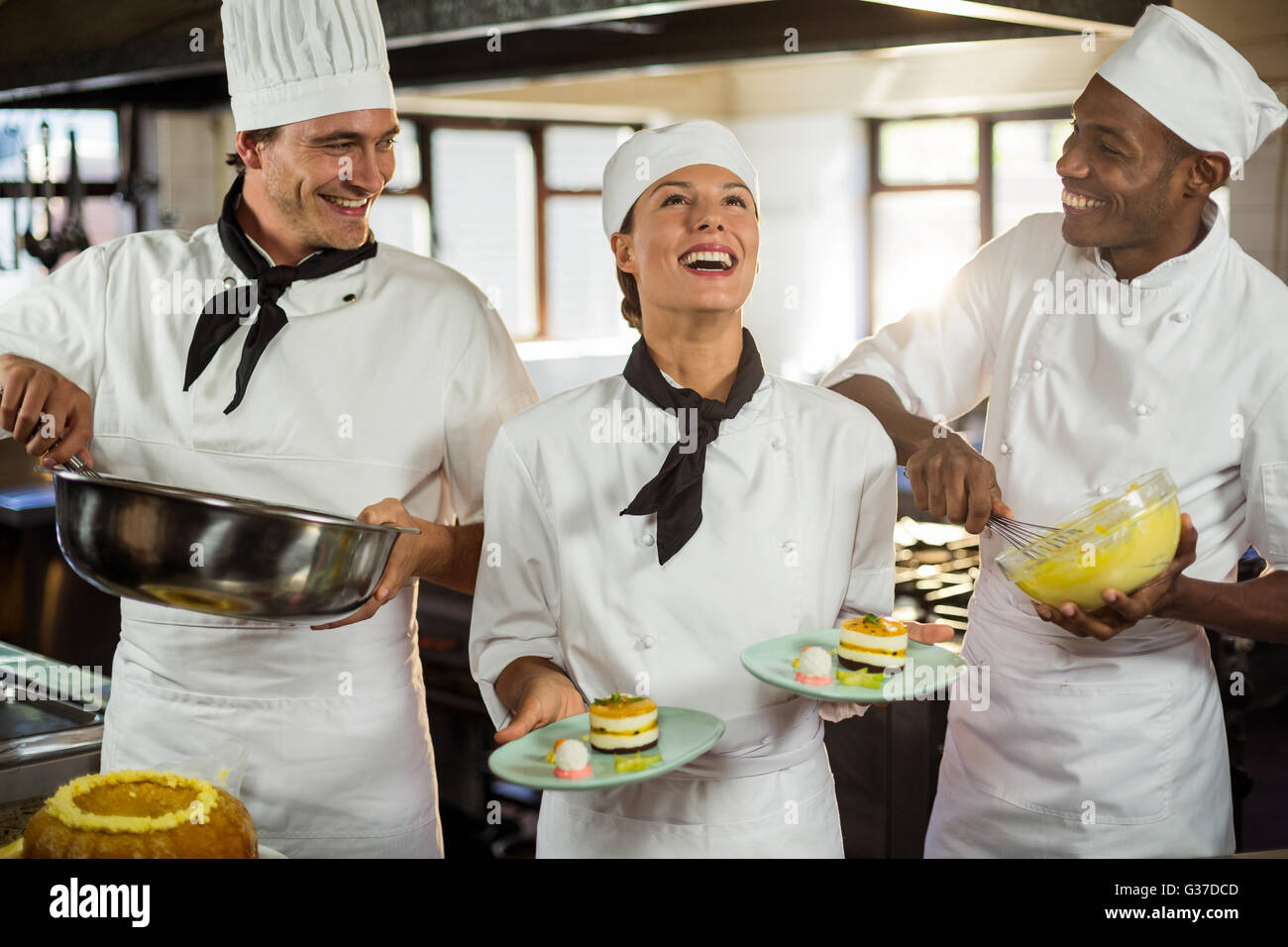 Chefs preparing a dessert Stock Photo - Alamy