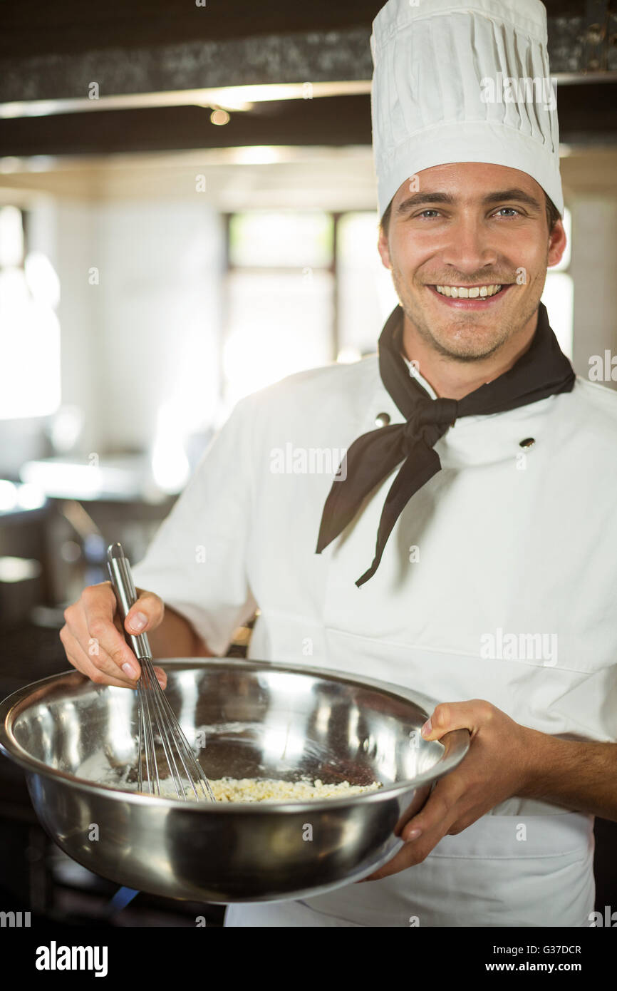 Chef holding cake smiling hi-res stock photography and images - Alamy