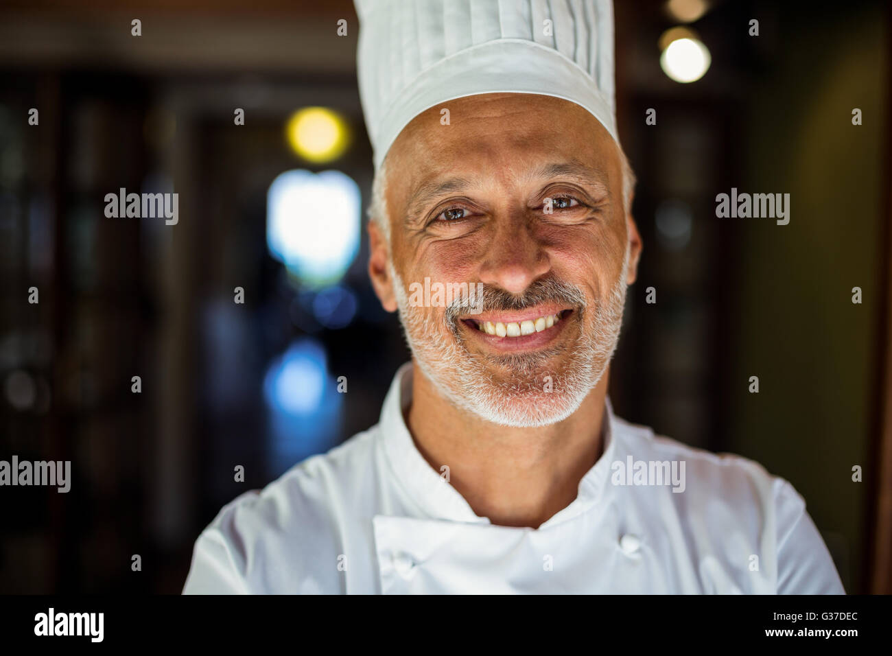 Portrait of smiling chef Stock Photo - Alamy