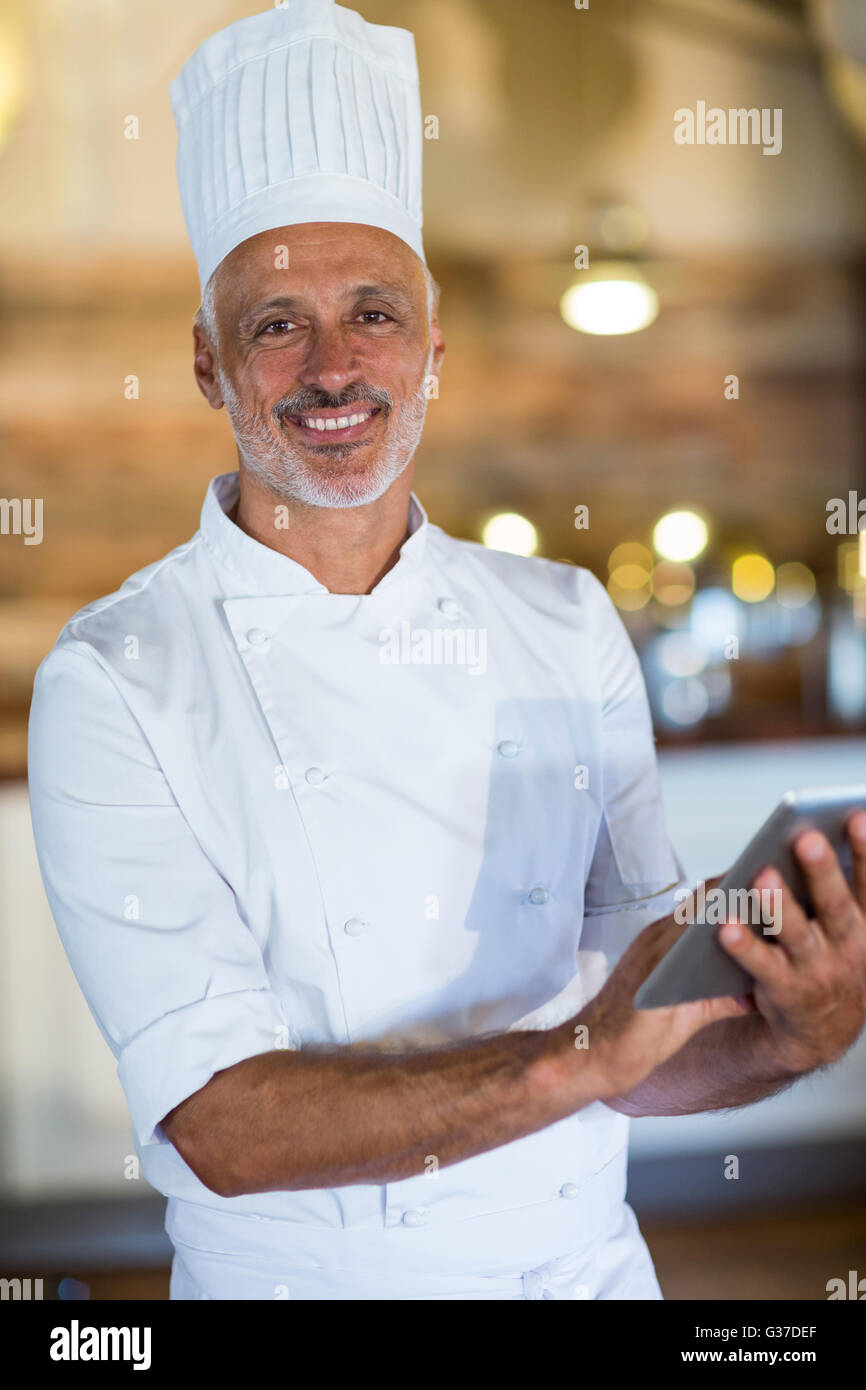 Male chef looking digital hi-res stock photography and images - Alamy