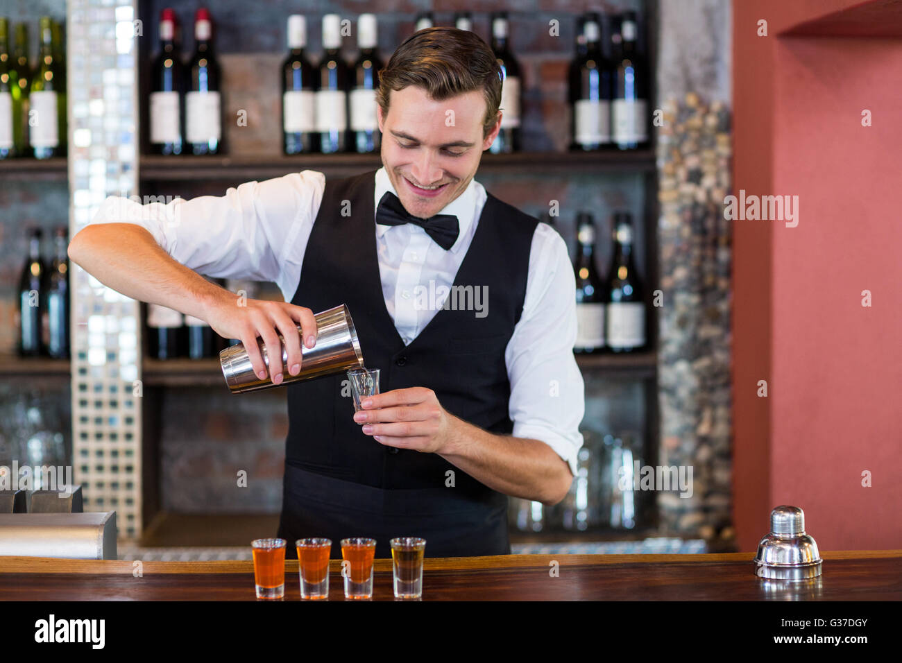 Pouring into shot glass hi-res stock photography and images - Alamy
