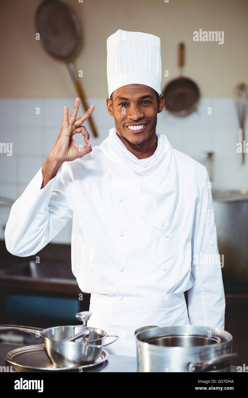 Portrait of happy chef making ok sign Stock Photo - Alamy