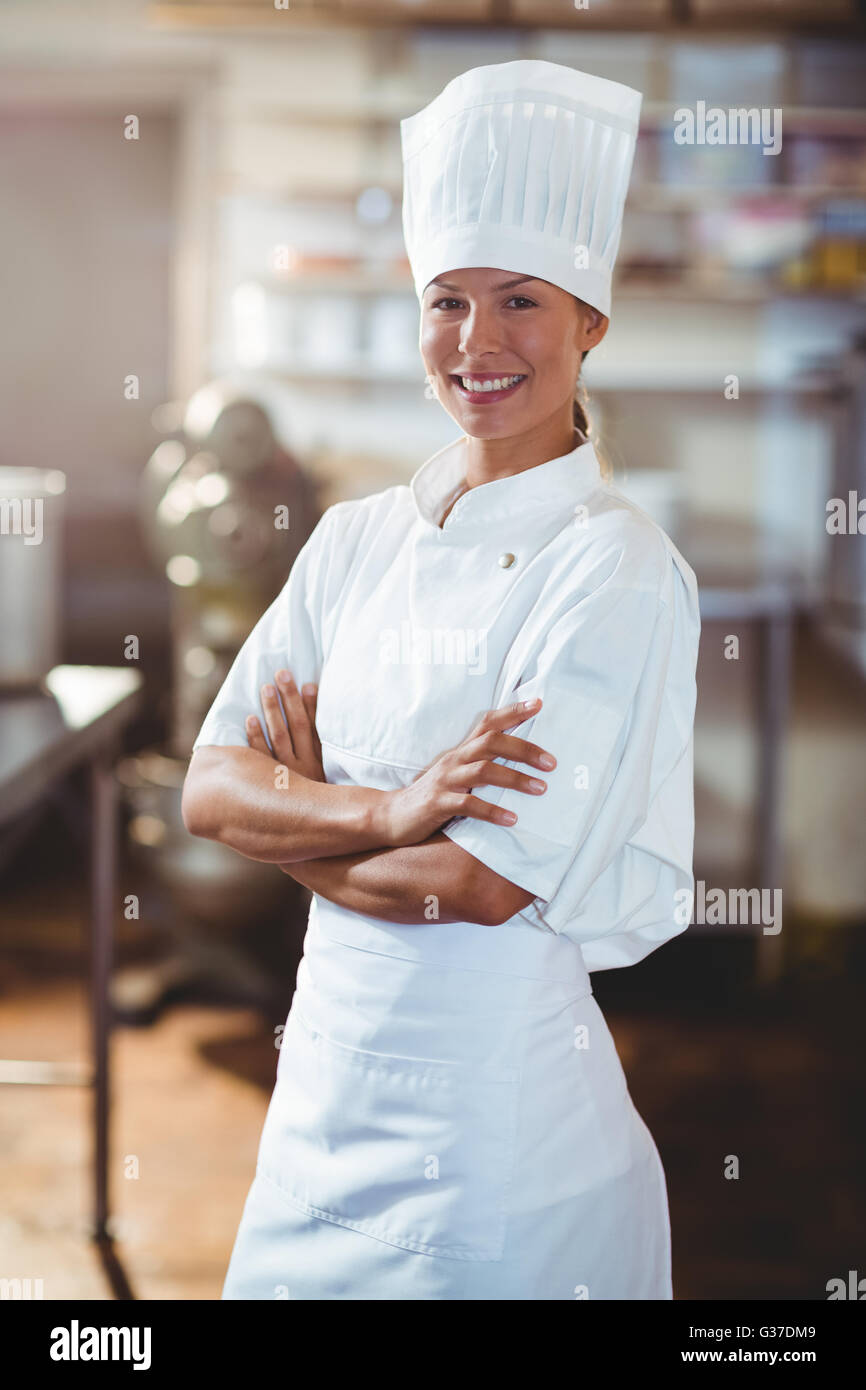 Happy female chef arms crossed hi-res stock photography and images - Alamy