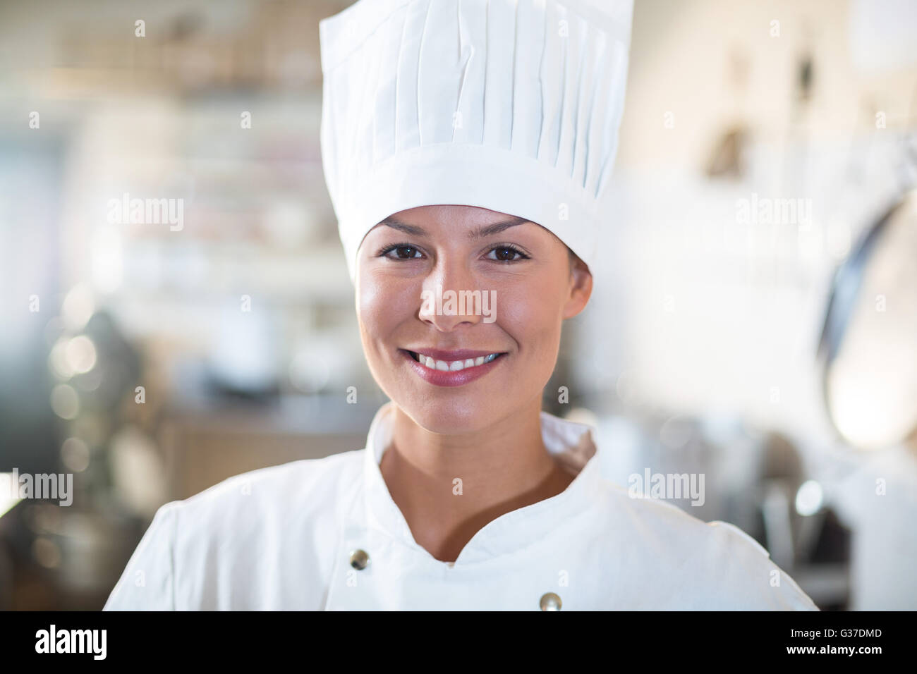 Portrait of smiling female chef Stock Photo - Alamy