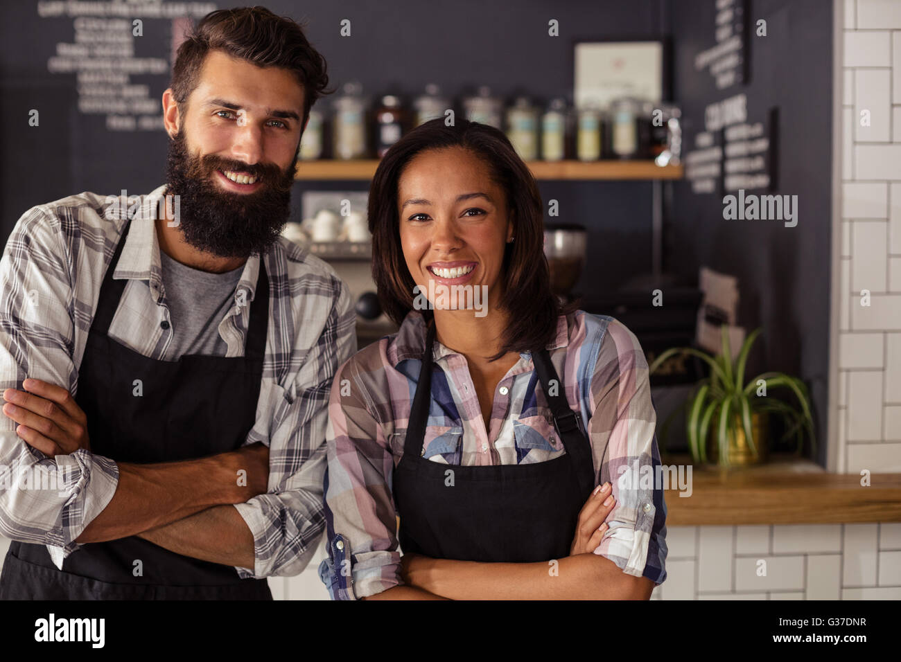 Portrait of two waiters Stock Photo - Alamy