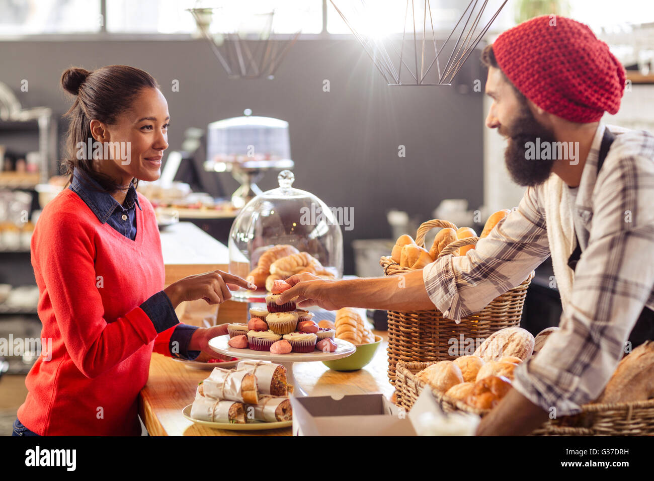 Man serving her a cake hi-res stock photography and images - Alamy