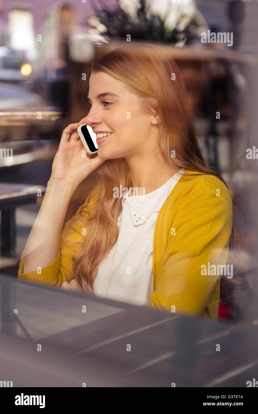 Casual woman on the phone Stock Photo - Alamy