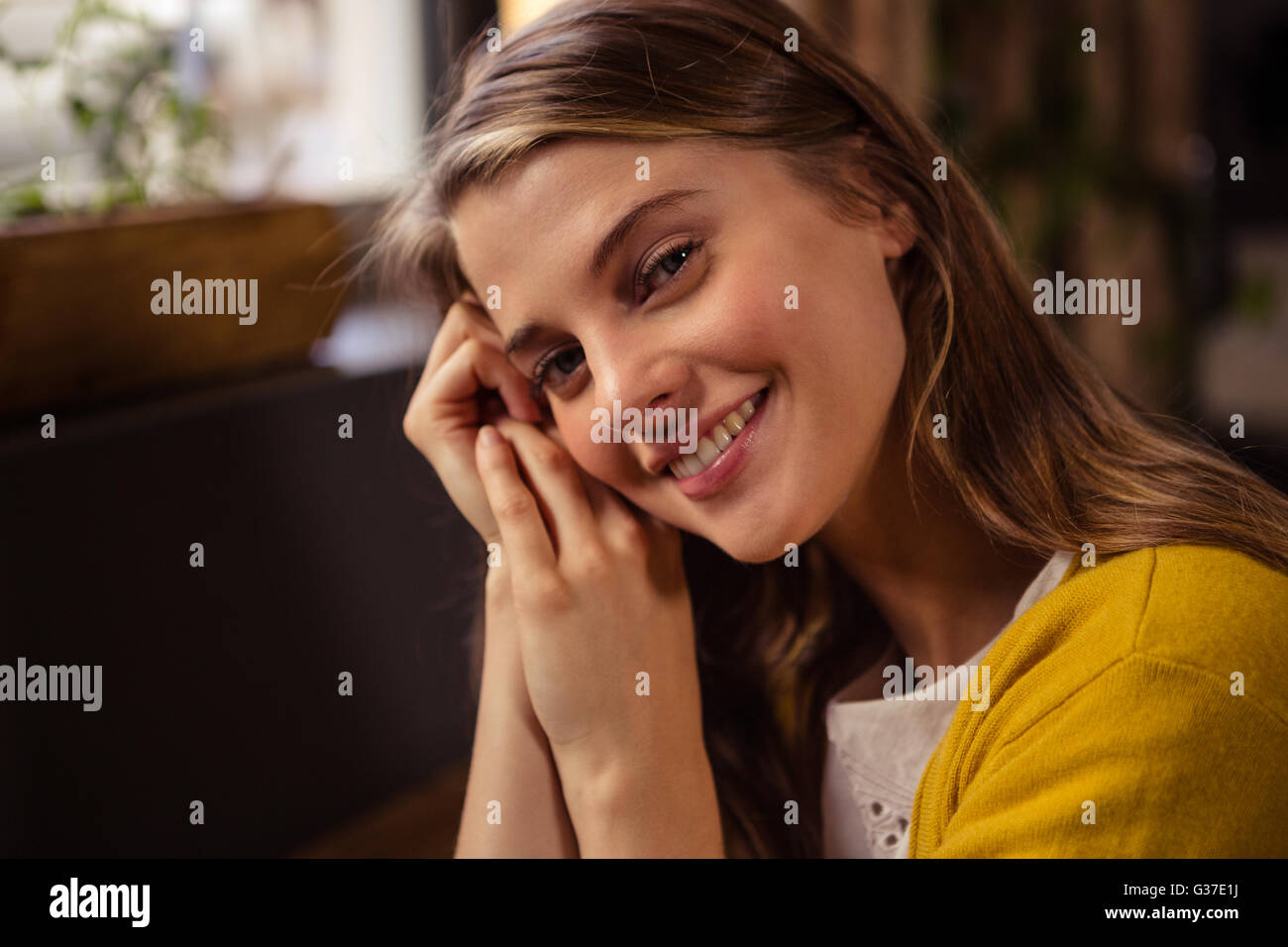 Smiling casual woman alone Stock Photo - Alamy