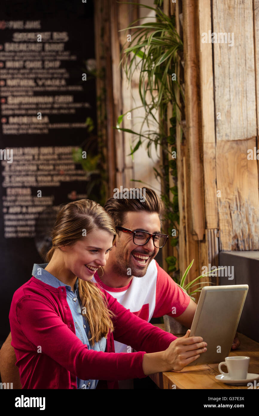 Couple using a tablet computer Stock Photo - Alamy