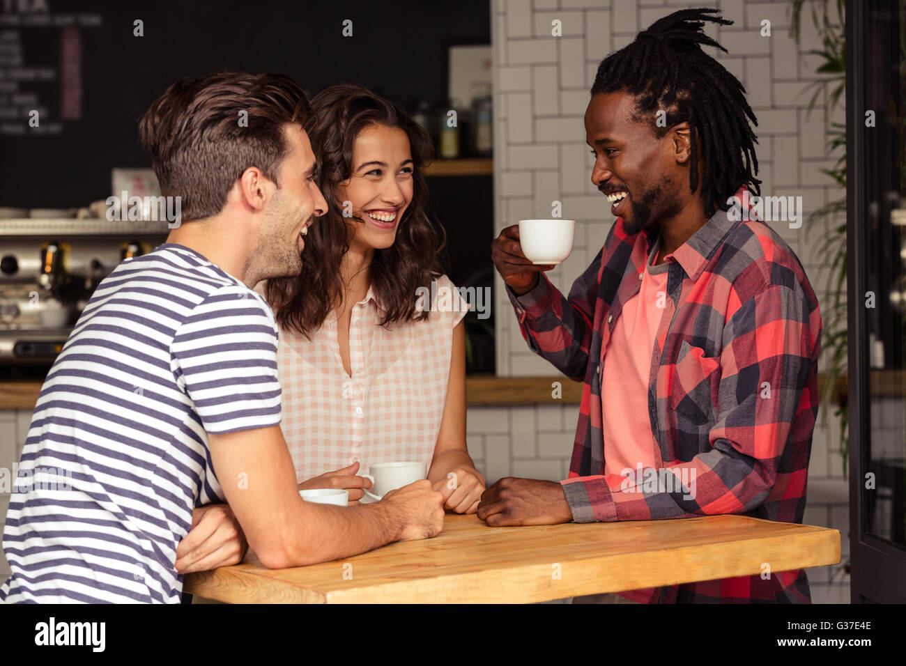 Male business friends talking cafe hi-res stock photography and images ...
