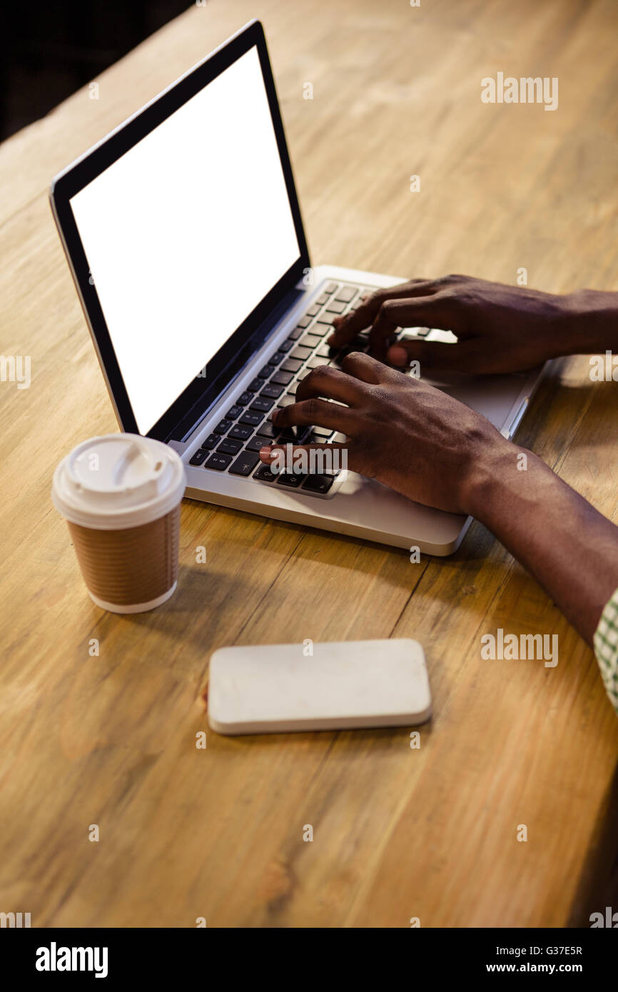 Hands man using laptop typing hi-res stock photography and images - Alamy