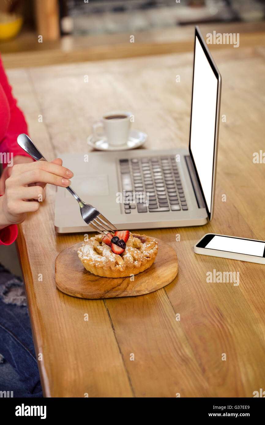Woman eating food restaurant alone hi-res stock photography and images ...