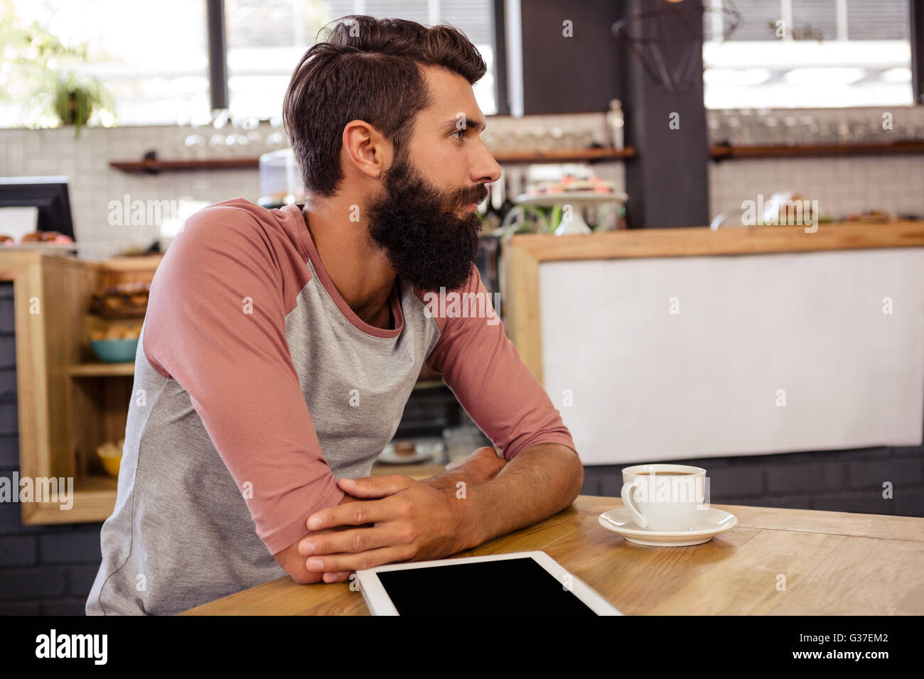 Man sitting at table hi-res stock photography and images - Alamy