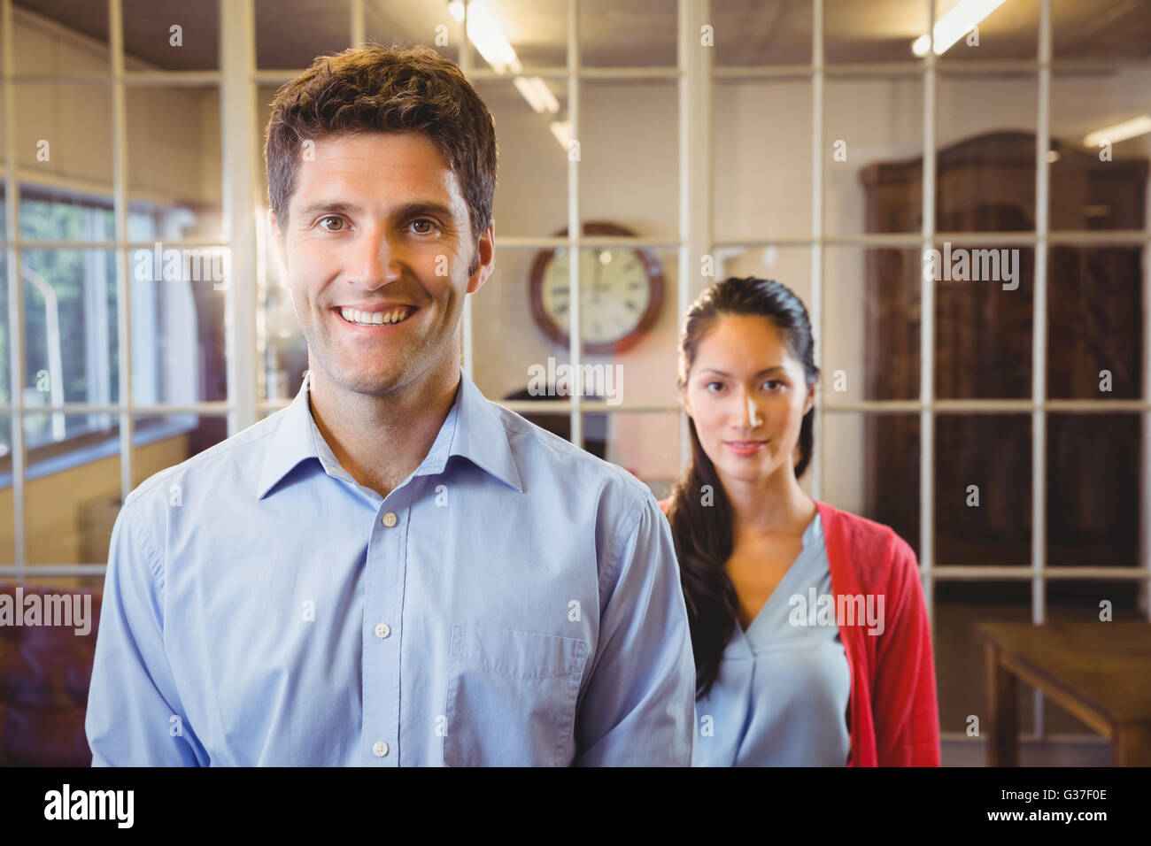 Business people posing together Stock Photo - Alamy