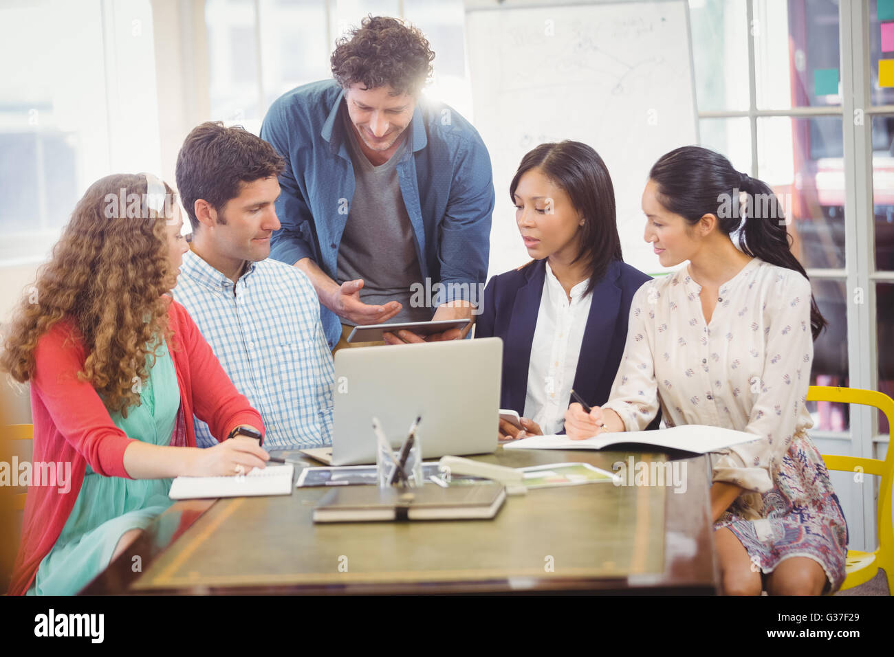 Business people working together Stock Photo - Alamy
