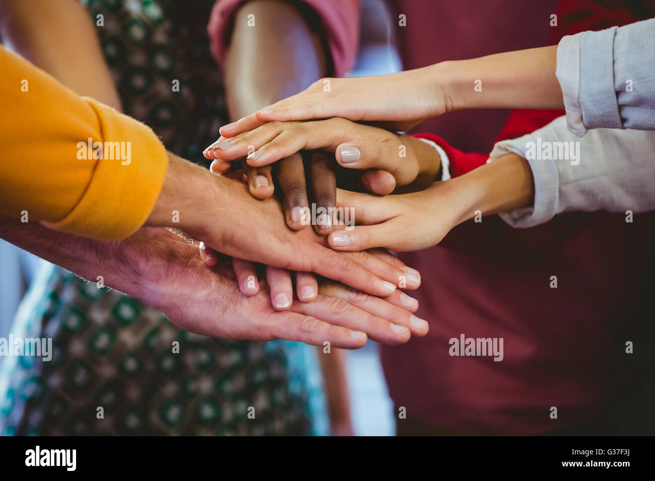 Focus on hands together Stock Photo - Alamy