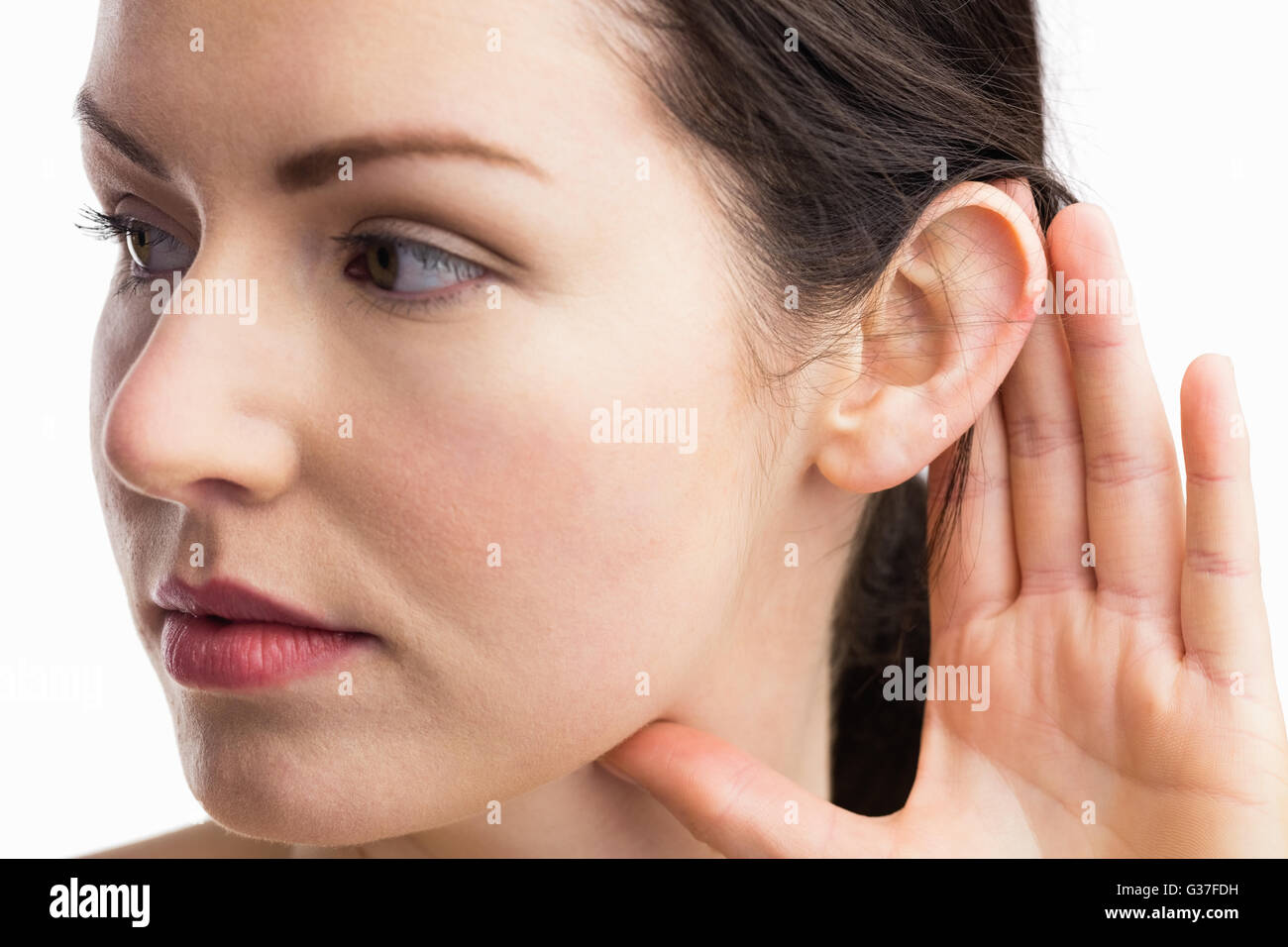 Woman showing her ear Stock Photo - Alamy
