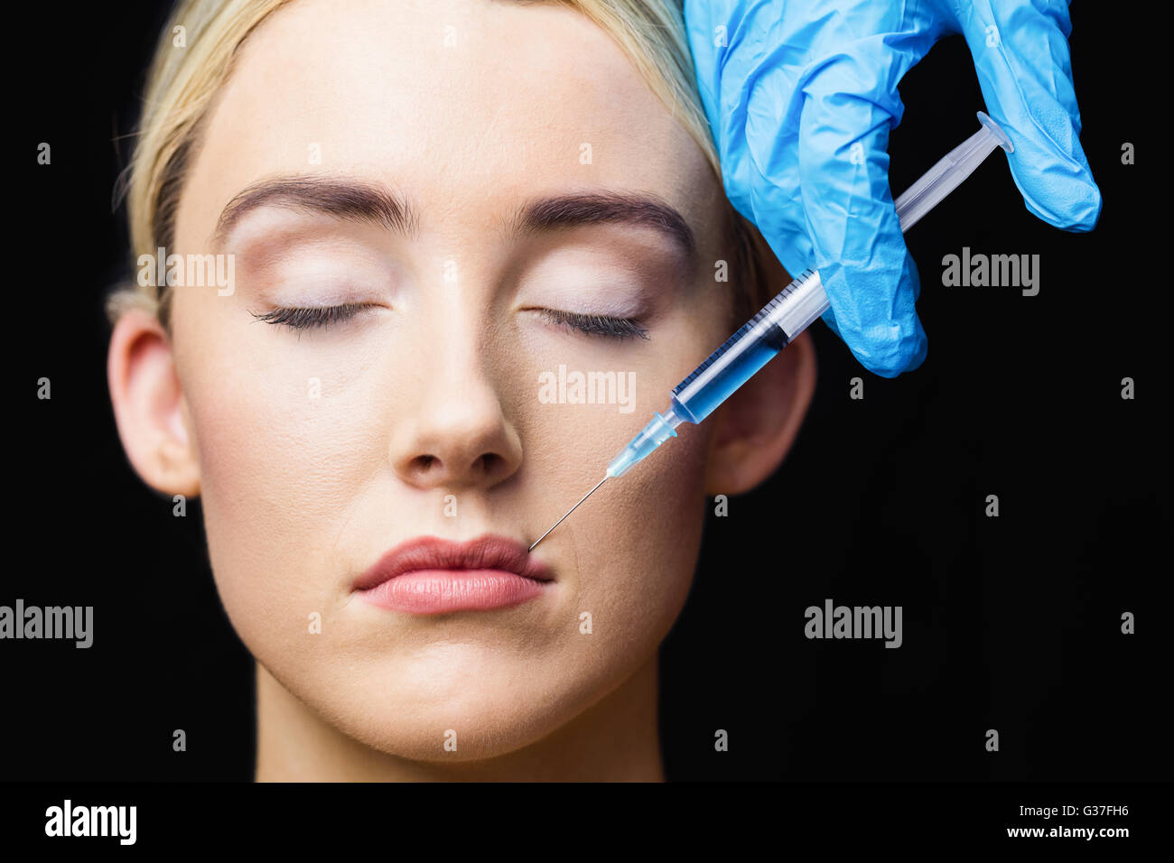 Black woman receiving cosmetic hi-res stock photography and images - Alamy