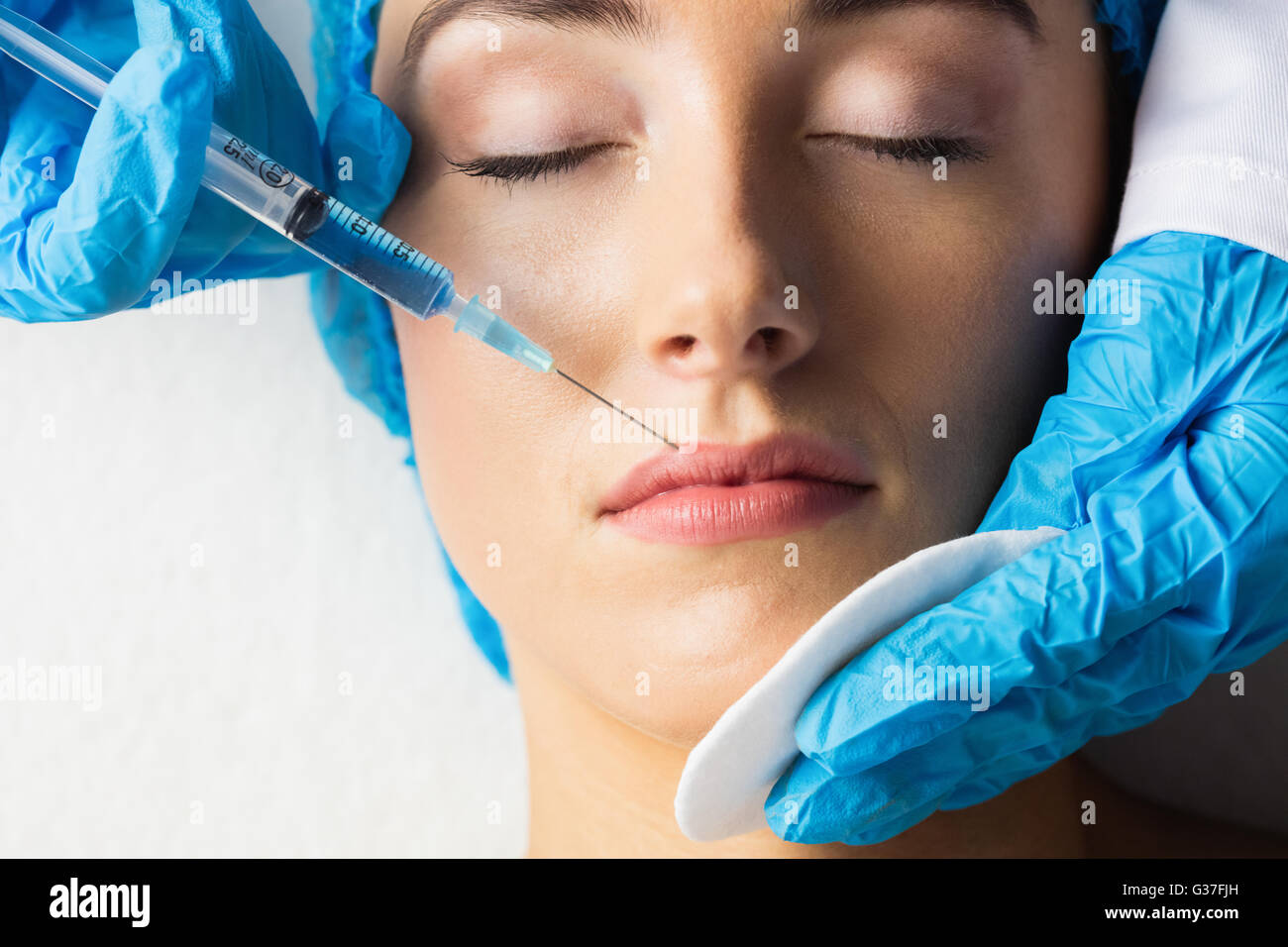 Woman injection lips hi-res stock photography and images - Alamy